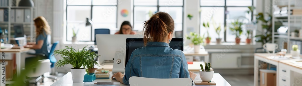 Office with large windows, natural light, employees collaborating ...
