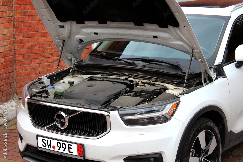 Vinnytsia, Ukraine; July 27, 2024. White Volvo XC40 open hood. Broken engine Volvo XC40 with the ...