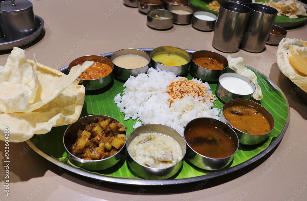 A South Indian thali or meal consists of steamed rice, sambar, rasam ...