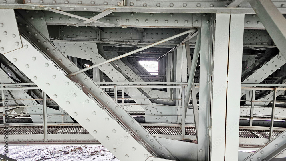 Ancient iron bridge structure, interior view, metal floor beams with ...