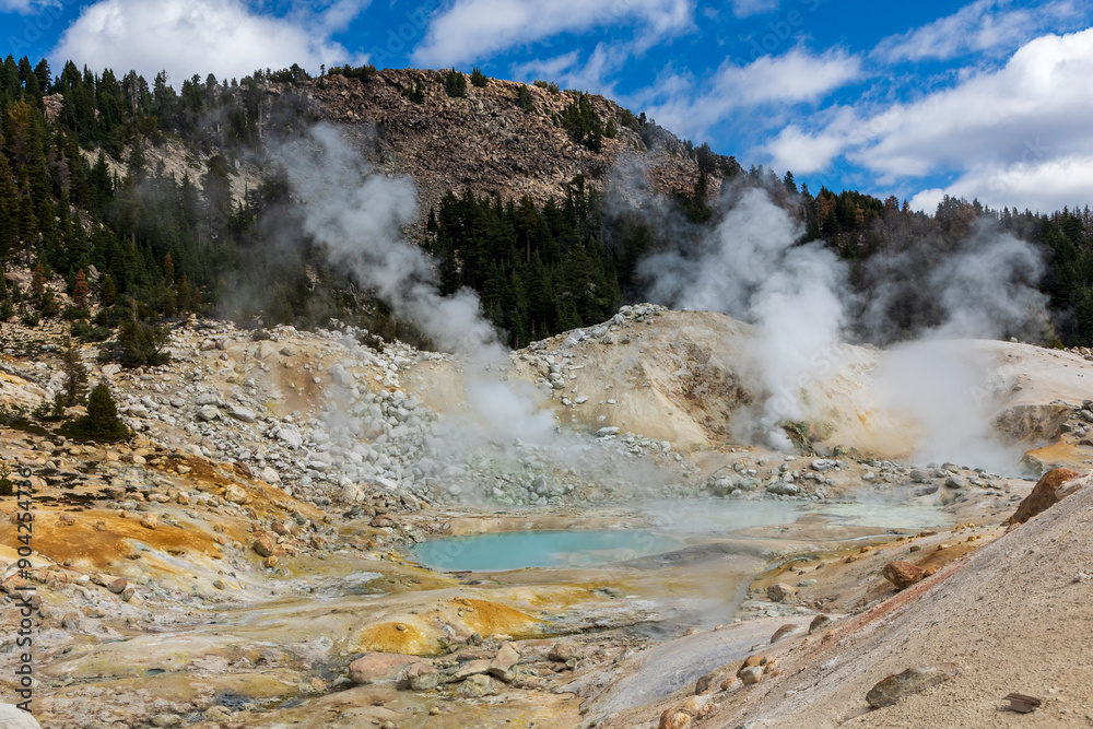 Poster dramatic volcanic landscape of hot steams and sulfur laden pools ...