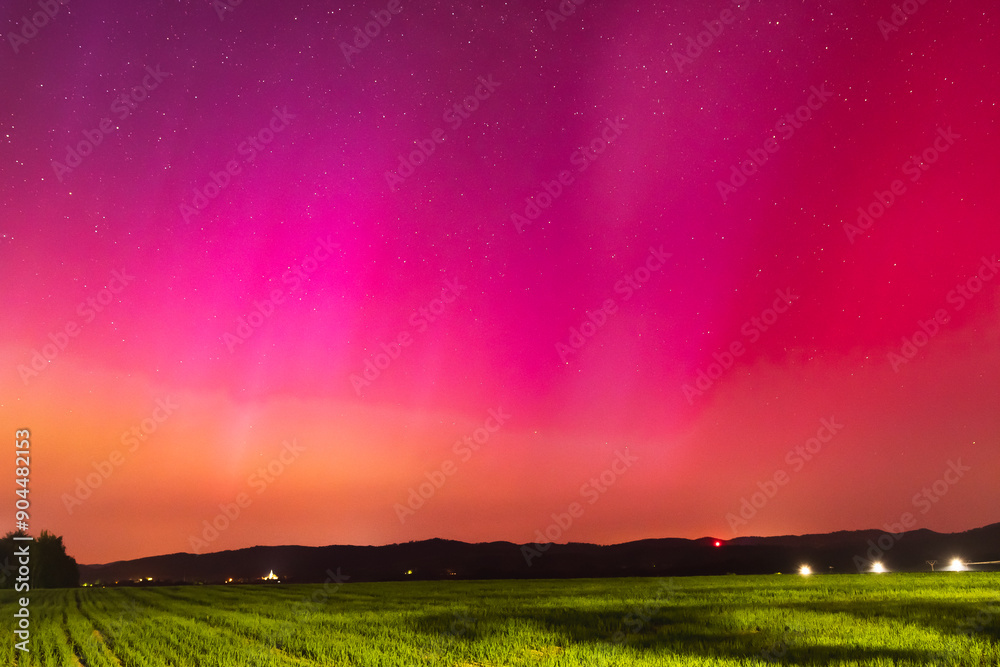 Northern Lights in Poland, a colorful show in the night sky, a light ...