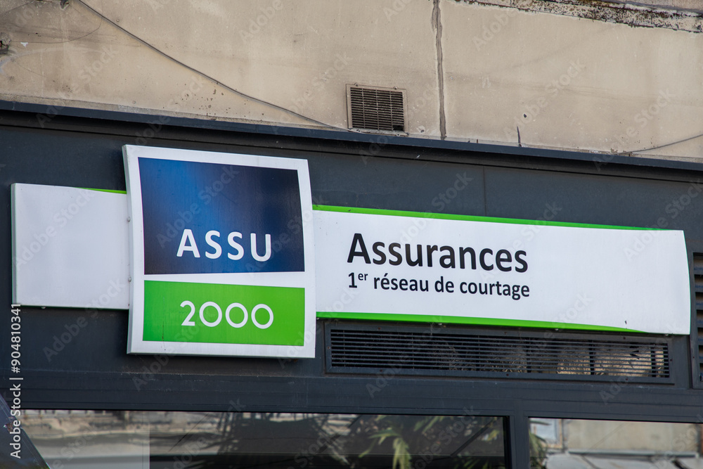 assu 2000 sign logo and brand text on entrance facade on insurance ...