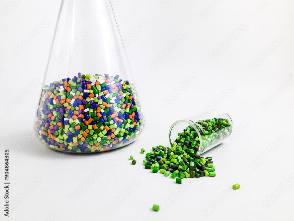 Various colors of mixed masterbatch granules, isolated on white ...