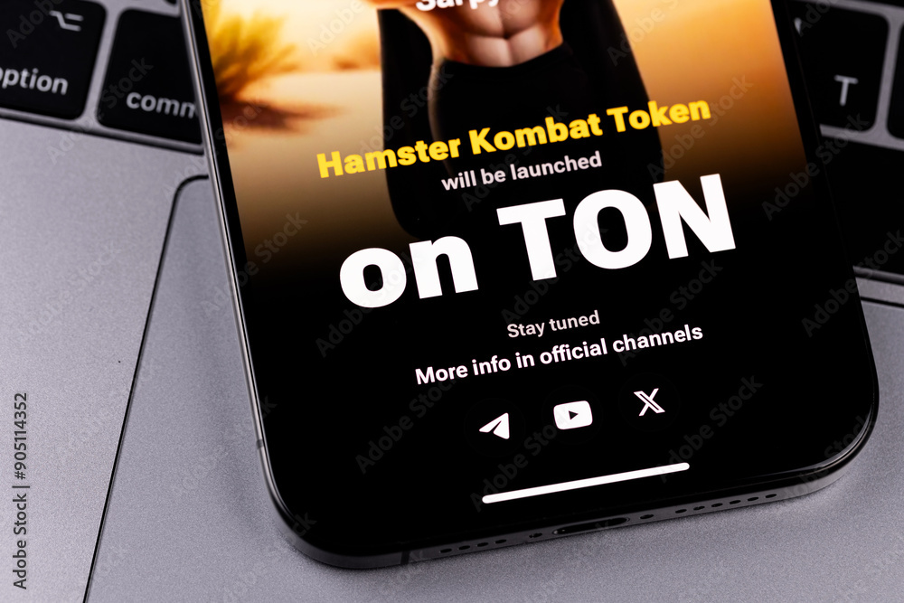 Hamster Kombat logo on a screen smartphone, iPhone. Hamster Combat is a ...