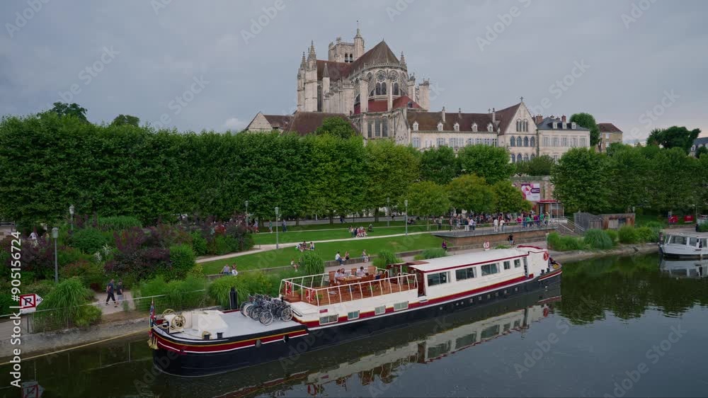 Old town center of Auxerre and the river Yonne with tourists visiting ...