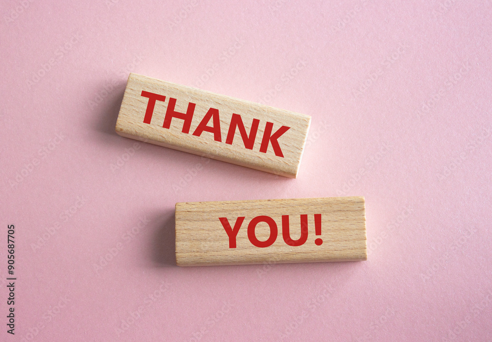 Thank you symbol. Wooden blocks with words Thank you. Beautiful pink ...