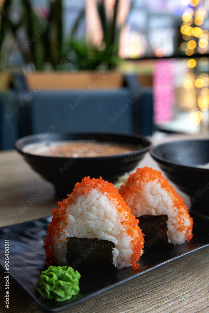 Onigiri or japanese rice balls served on the wooden tabletop in the ...