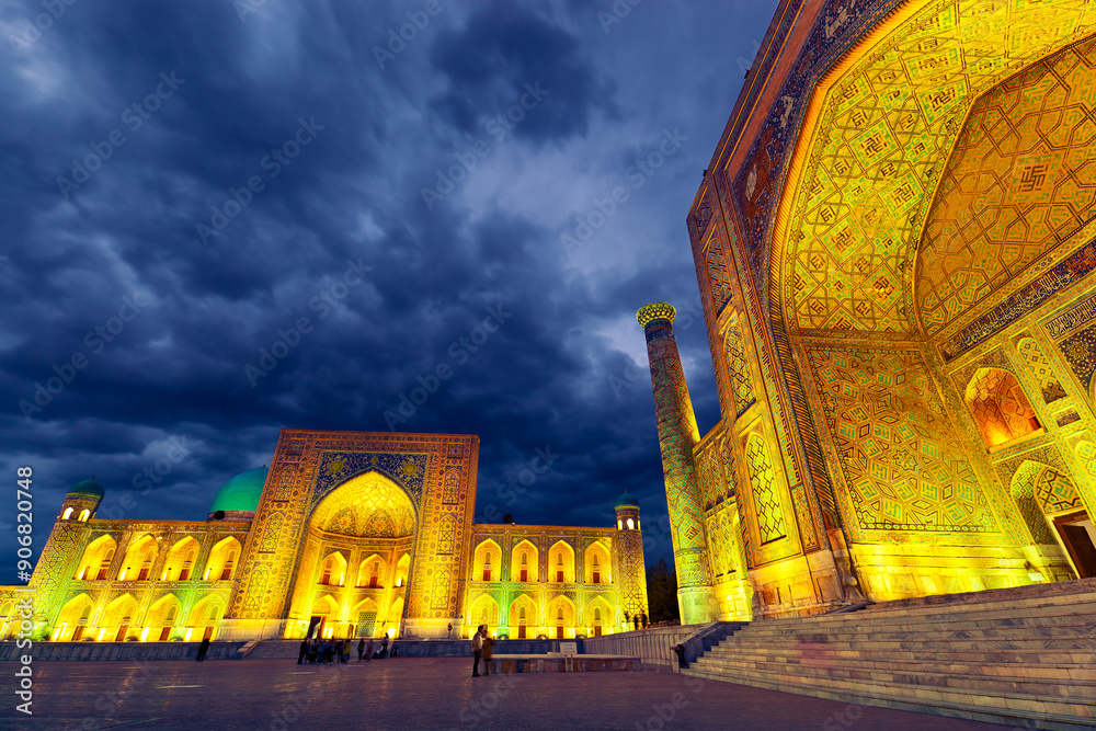 Ornate gate of Madrasah Sherdor and Madrasah and Mosque Tilya Kori as ...