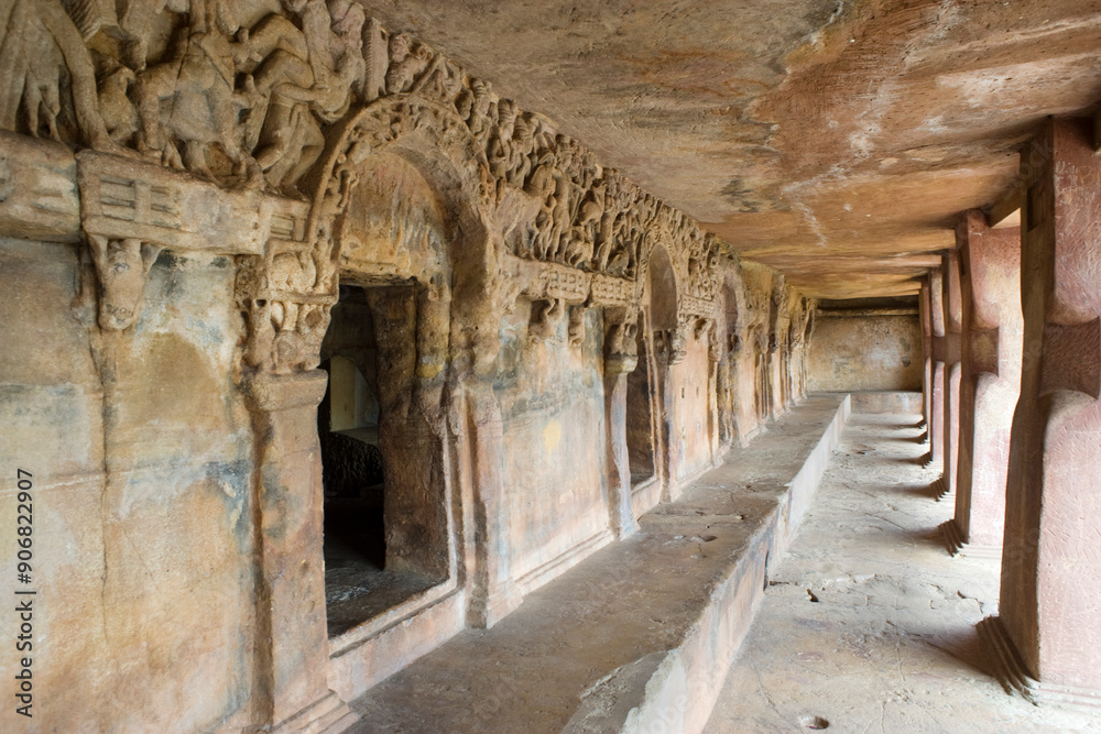 Monks' cells cut into the hillside rock among the Udayagiri and ...