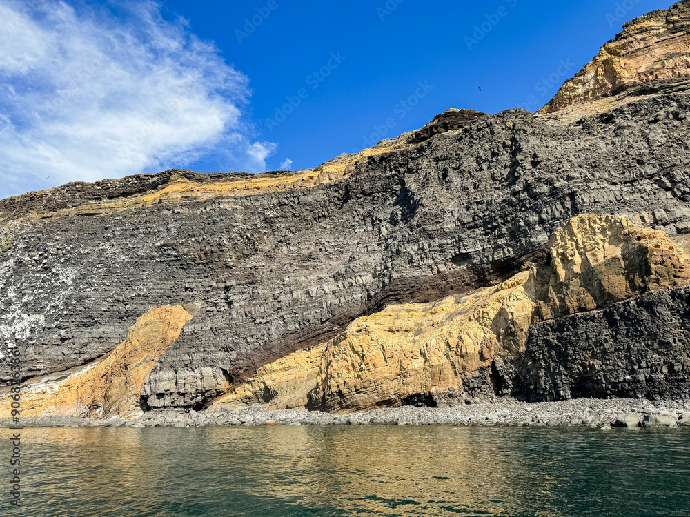 Layers of lava flows and tuff from the dormant volcano on Isla Tortuga ...