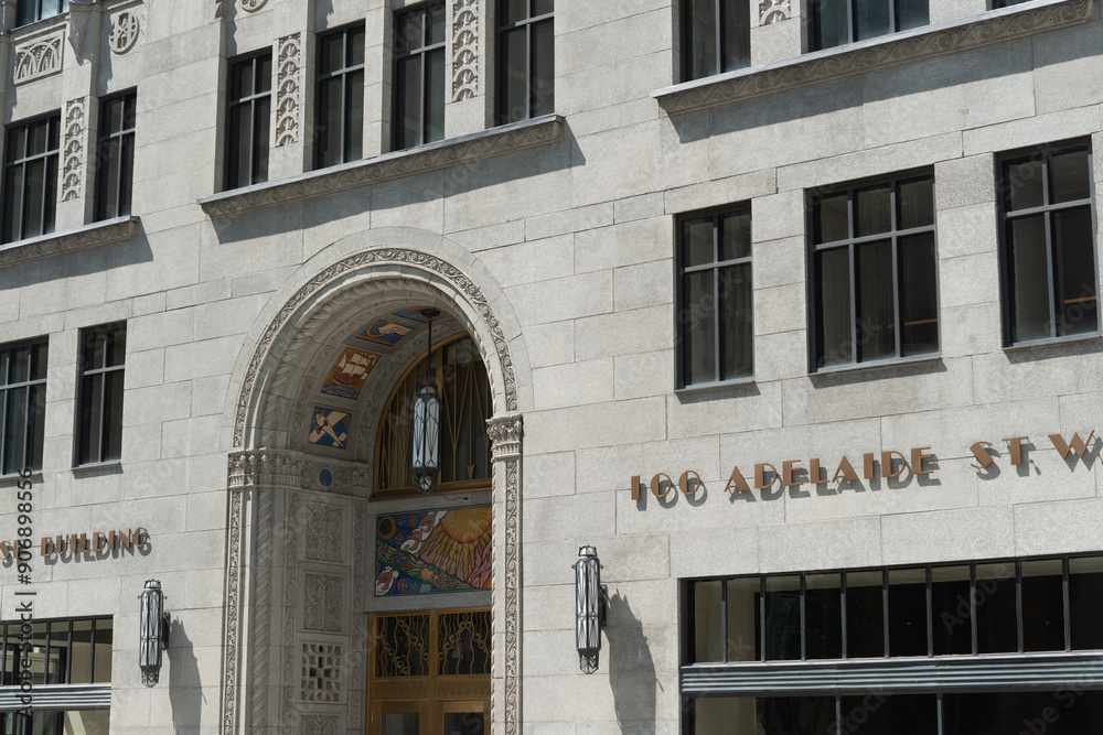detail of arched entry and stone facade of Concourse Building located ...