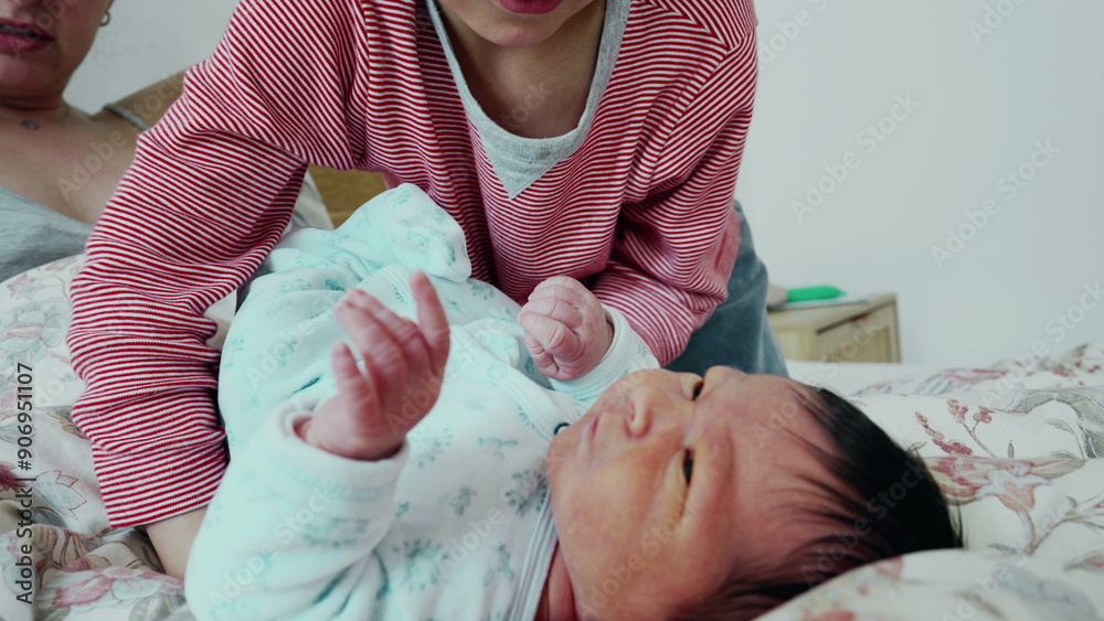 Brother and newborn baby authentic interaction during initial days of ...