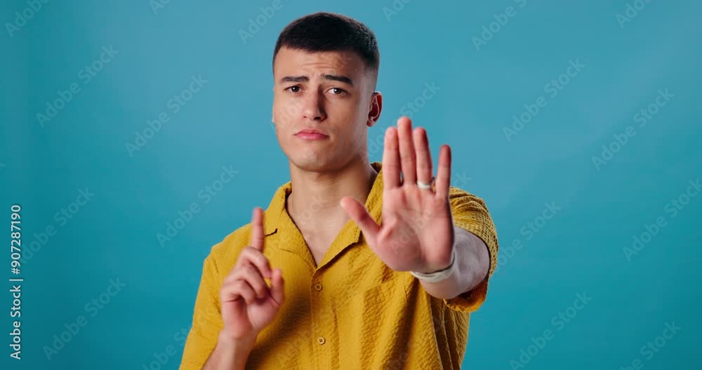 Face, palm or man with no hand gesture in studio on blue background for ...