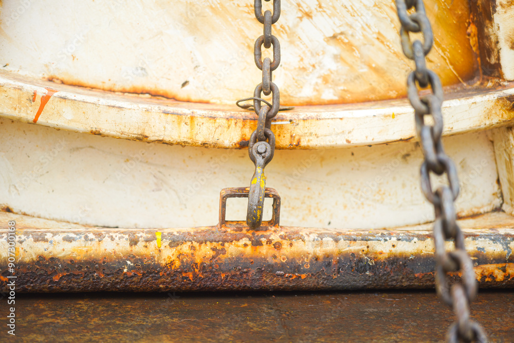 Steel chain and hook securing anchor, using to secure heavy object that ...