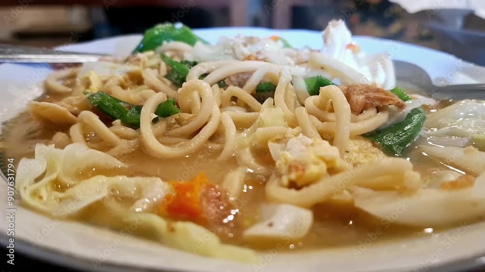 Chicken noodle soup. The traditional food of Javanese that call Bakmi ...