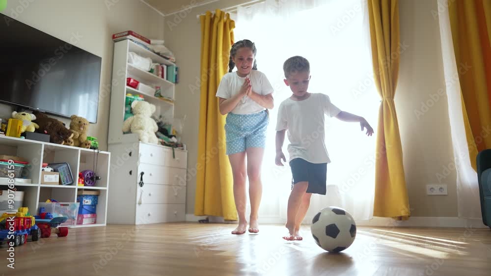 Happy children playing at home. Siblings enjoying indoor activities ...