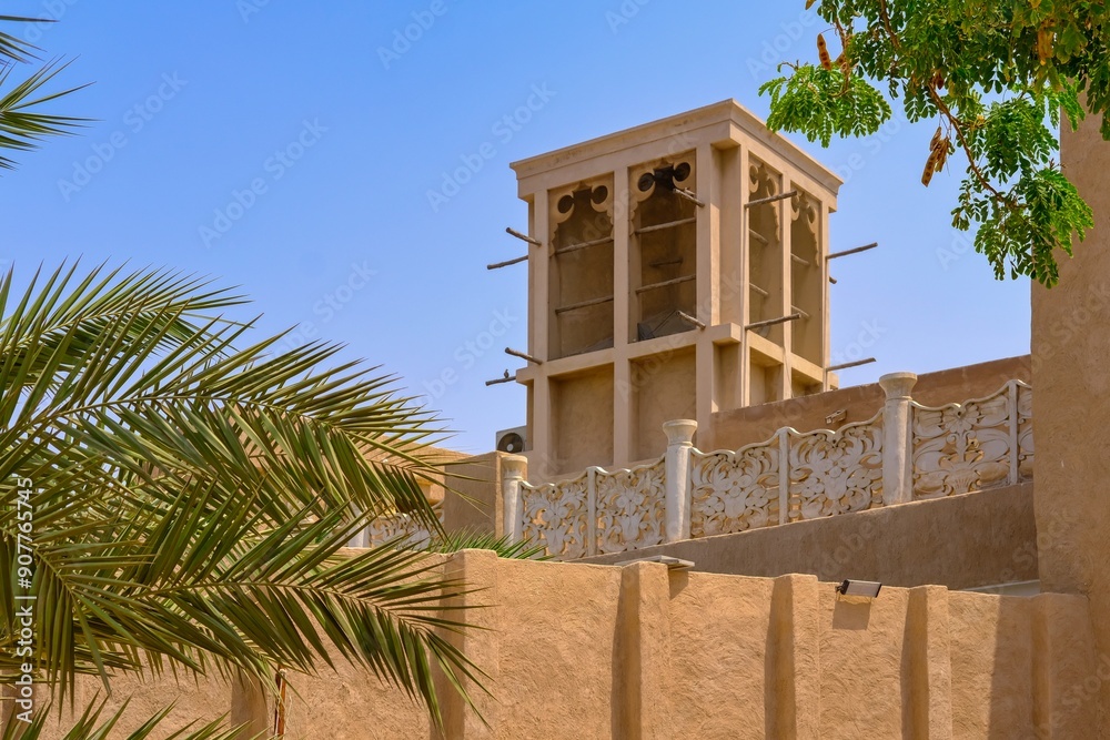Traditional Arabic house with wind catcher tower or Barjeel for cross ...