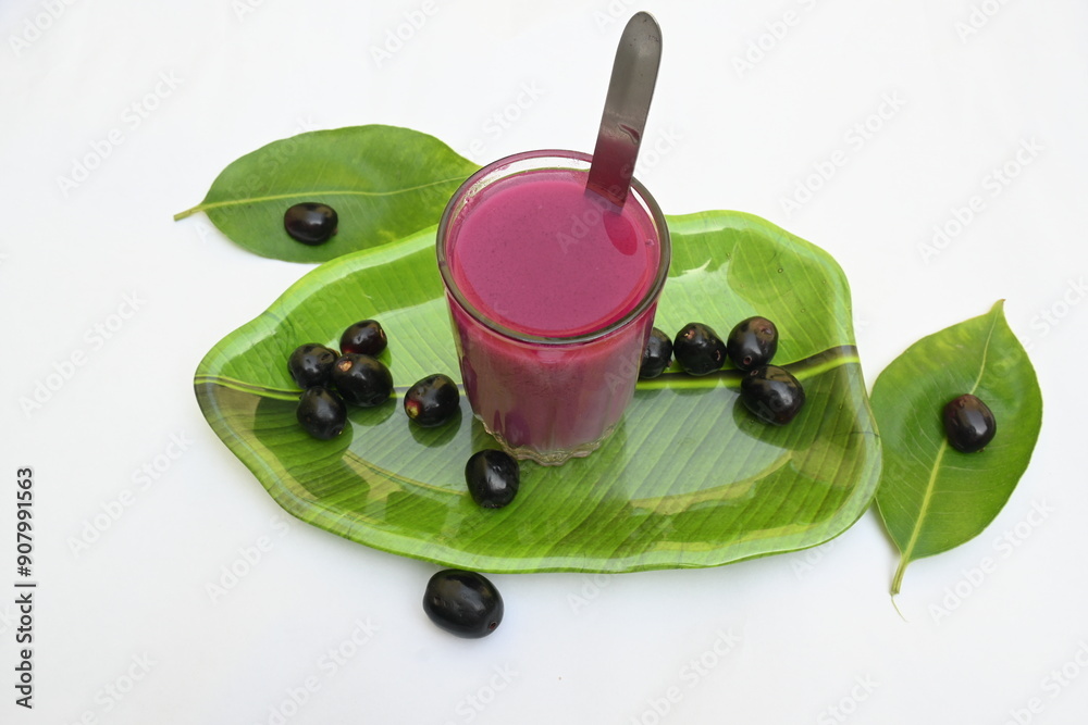 Syzygium cumini fruits juice. Its other names Malabar plum, Java plum ...