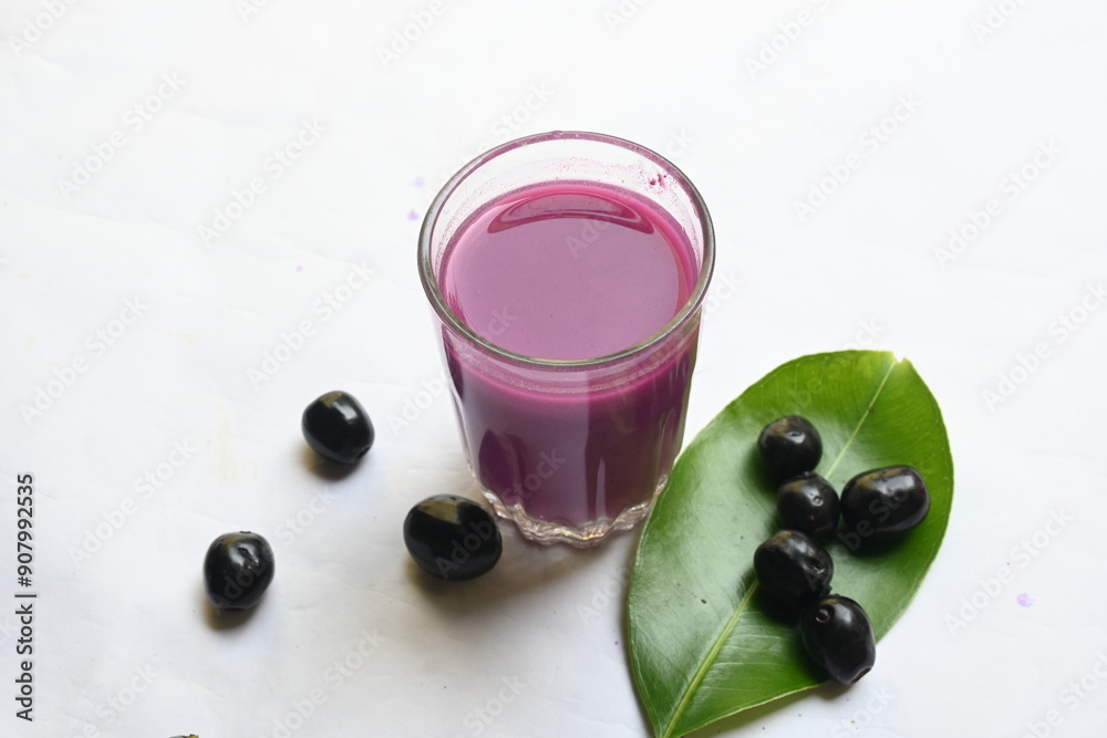 Syzygium cumini fruits juice. Its other names Malabar plum, Java plum ...