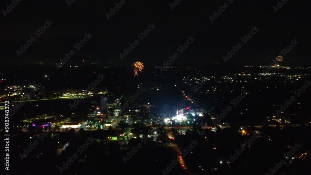 City Nightscape with Fireworks, An aerial view of a city nightscape ...