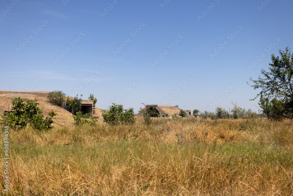 Hangar Empty aircraft hangar. Abandoned bunker. Lost airfield. Entrance ...