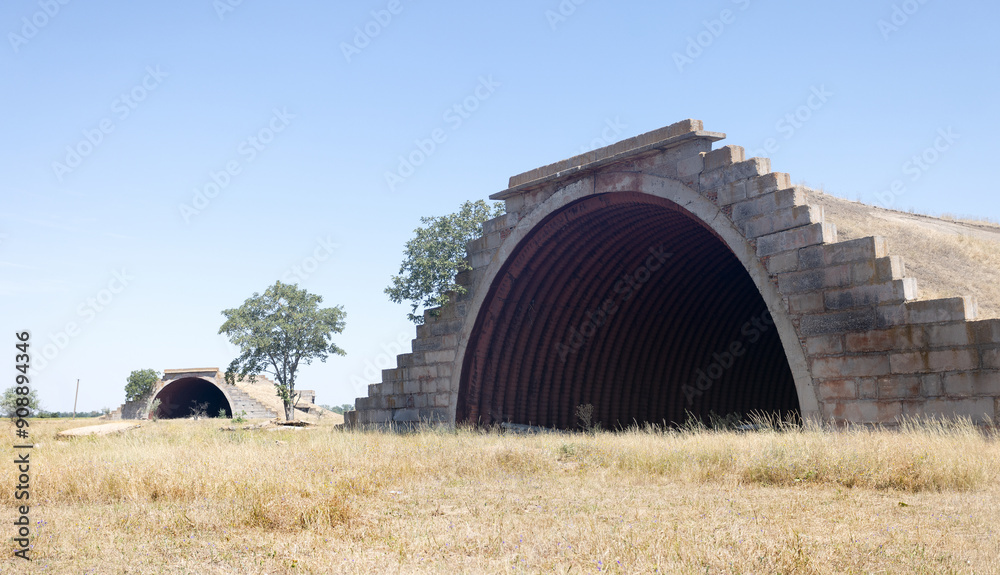 Hangar Empty aircraft hangar. Abandoned bunker. Lost airfield. Entrance ...