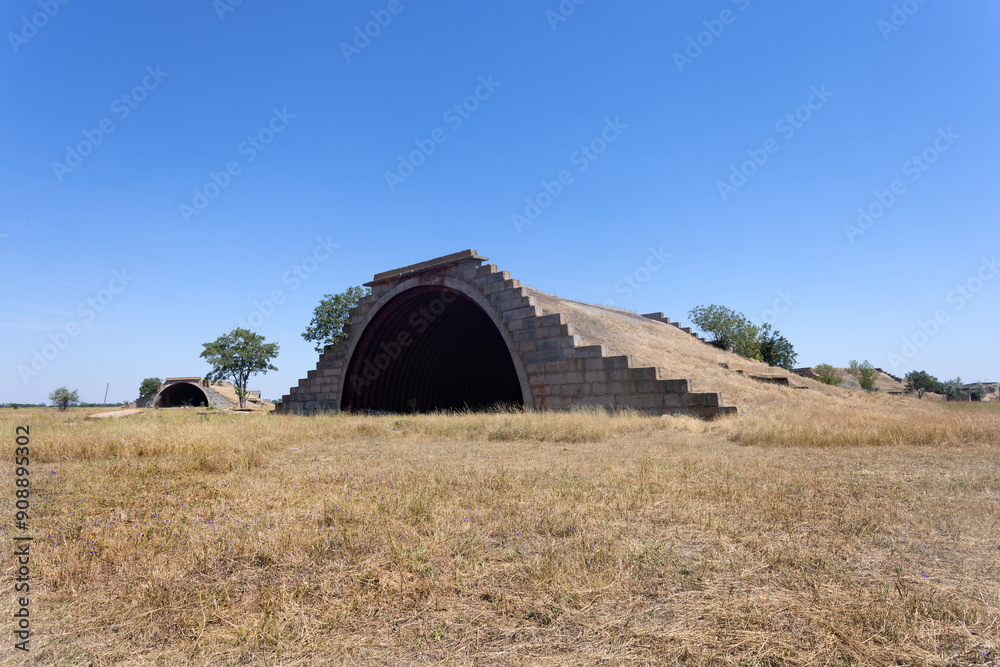 Hangar Empty aircraft hangar. Abandoned bunker. Lost airfield. Entrance ...