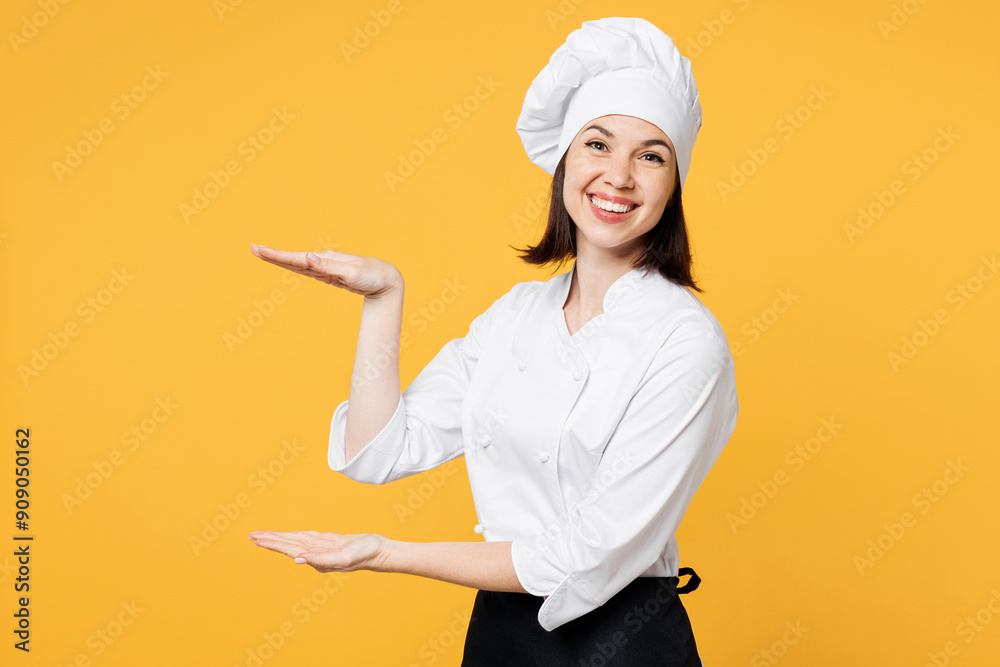 Side view young chef cook baker woman wear white shirt black apron ...