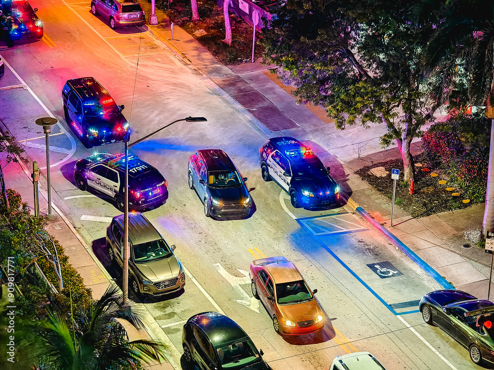 Miami Beach, Florida, USA - July 14, 2024: Aerial view of Police cars ...