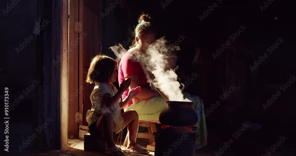 An Asian woman who is a farm laborer in Thailand, live in an old worker ...