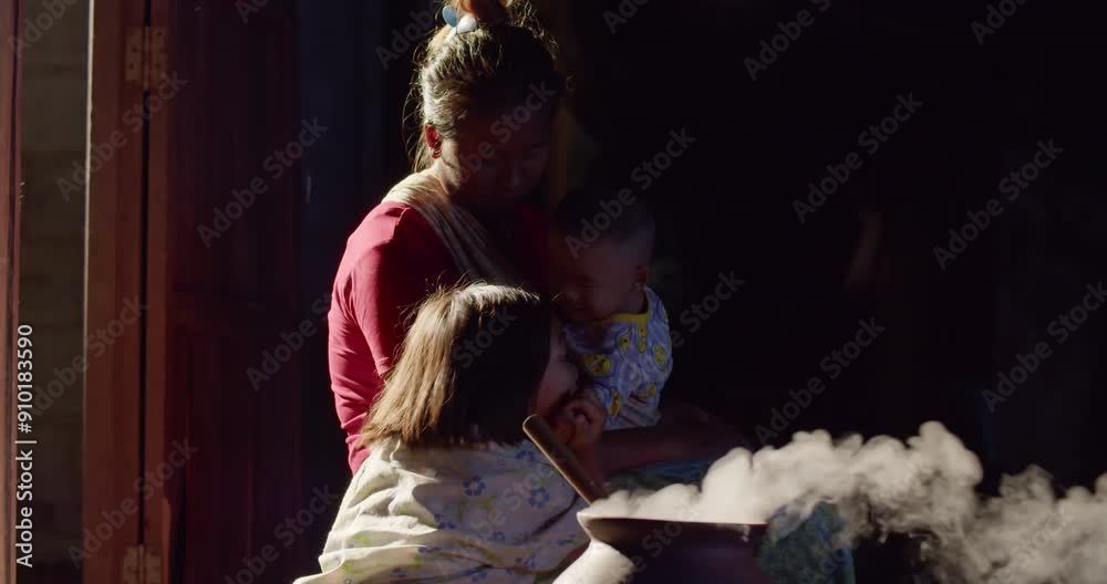 An Asian woman who is a farm laborer in Thailand, live in an old worker ...