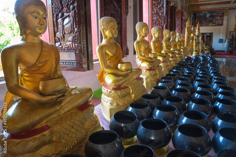 Majestic Golden Buddha Statues with Offering Bowls in a Serene Temple ...