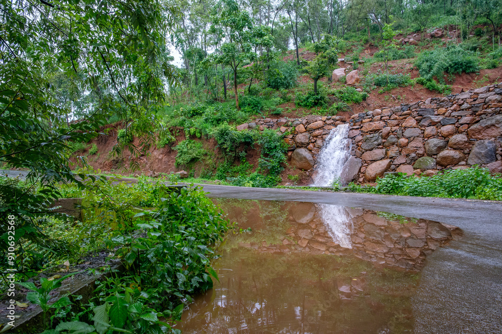 A waterfall during the monsoons near Pune India. Monsoon is the annual ...