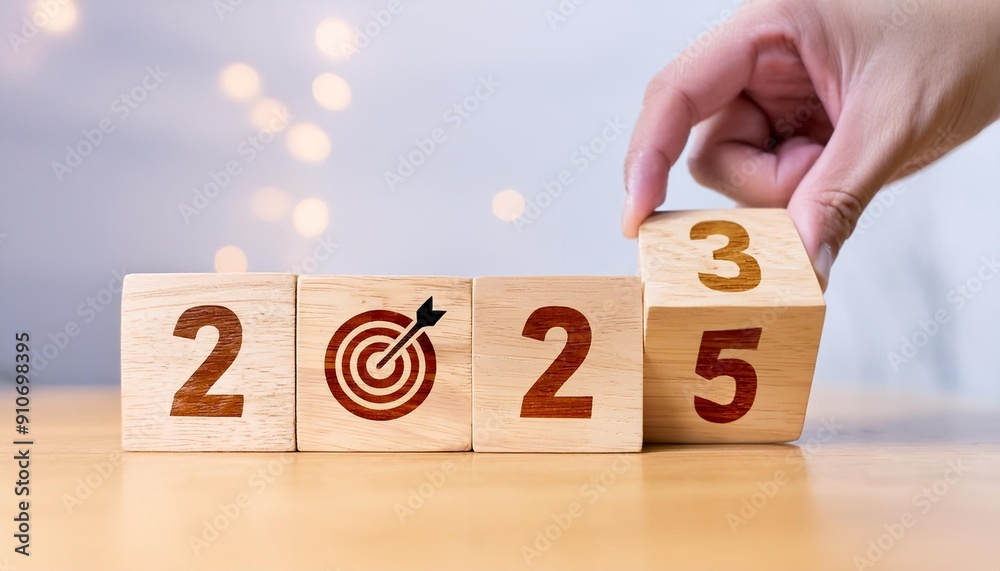 2025 business goals. Wooden block with 2025 word and target icon. Stock ...