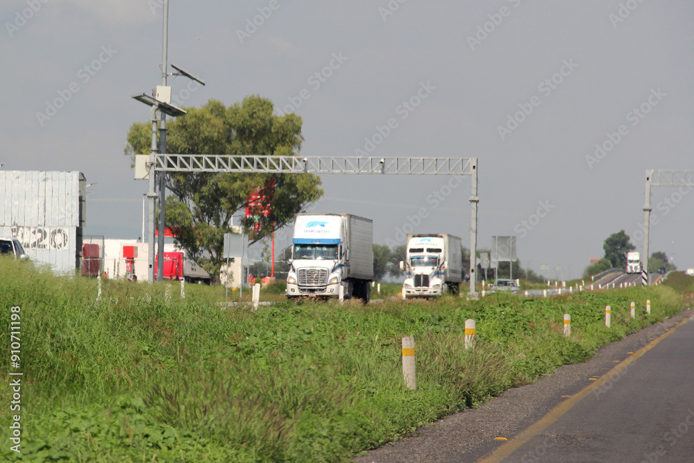 Queretaro, Mexico - Jul 28 2024: Excessive trailers circulate on the ...