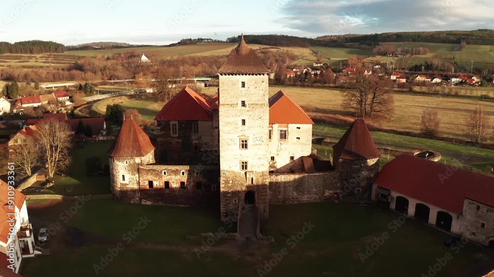 Experience a breathtaking aerial view of a majestic castle nestled ...