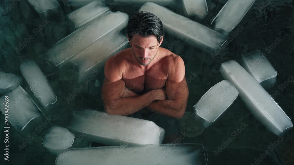 Strong Man Standing in Cold Water of Swimming Pool with Ice Cubes for Body Health. One Sports ...
