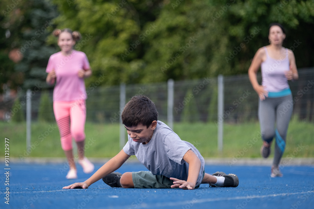 girl runs, runner falls, teenager falls, children's sports, runner ...
