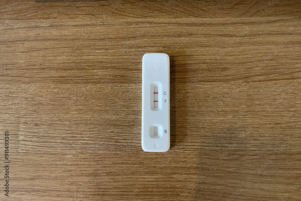 Coronavirus COVID 19 home test kit showing a positive result from an ...