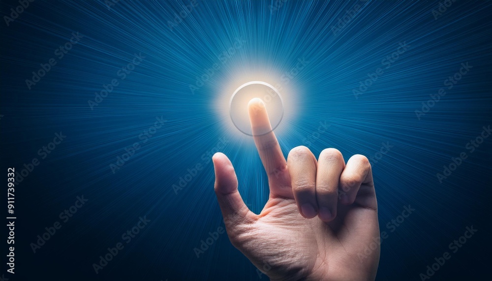 An index finger pointing into the air with glowing lights raying out ...