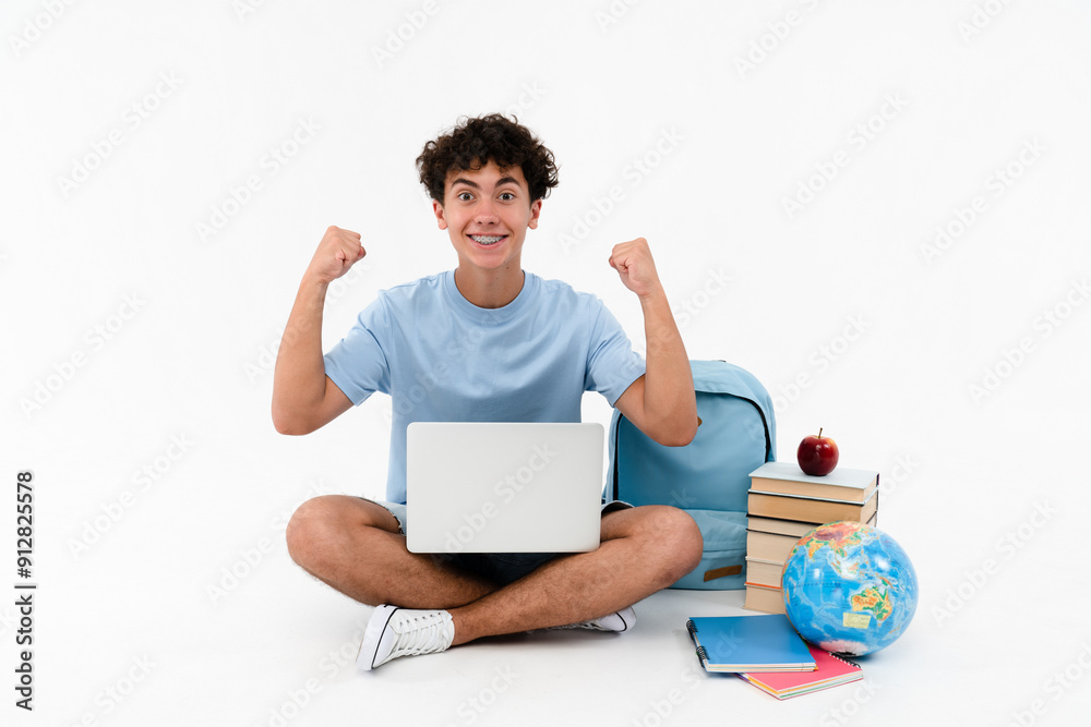 Happy boy winner guy high school male pupil student teenager sitting ...