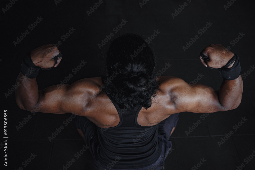 Muscular bodybuilder poses,top view, arms and biceps ideal for fitness ...