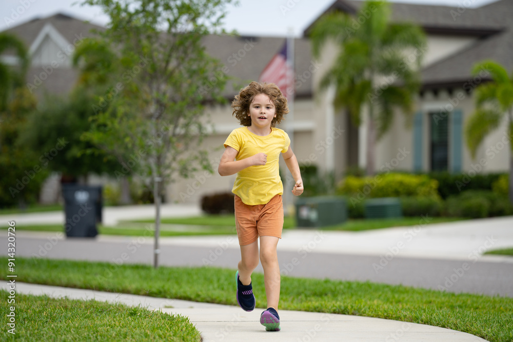 Excited Kid running in street. Amazed child enjoy run. Happy little boy ...