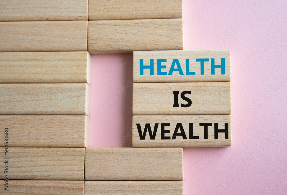 Health is Wealth symbol. Concept word Health is Wealth on wooden blocks ...
