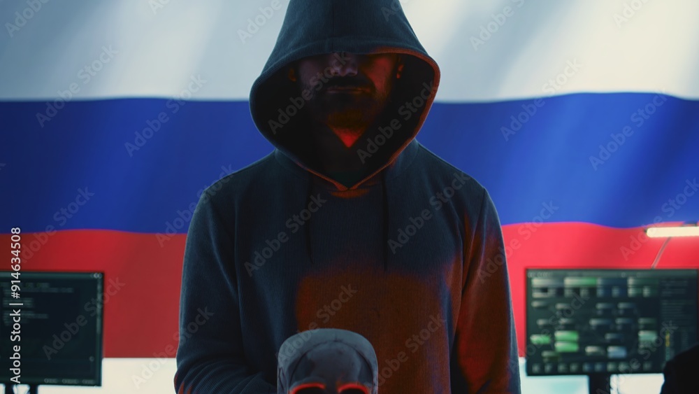 Russian cyber criminal making harmful death threats with a skull ...