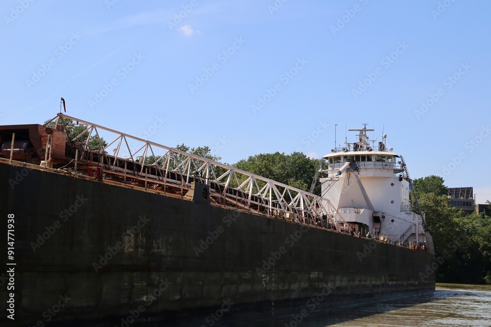 Bulk type nautical ship. The diesel-powered Lake freighter is equipped ...