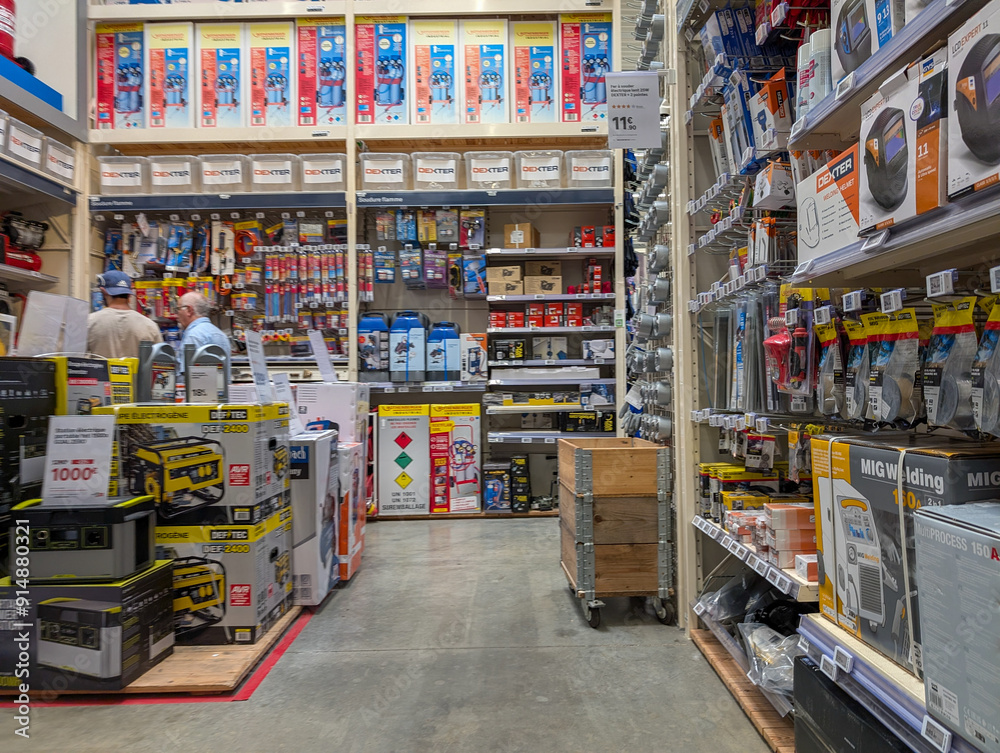 France, 13 July 2024: Interior view of a hardware store aisle with ...
