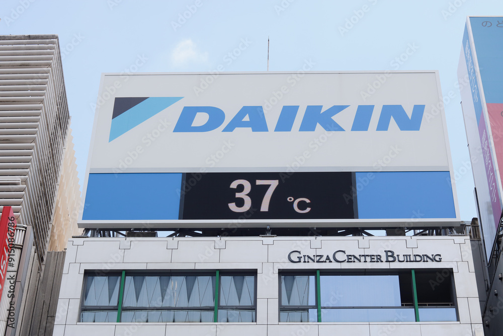 TOKYO, JAPAN - August 9, 2024: Daikin sign displaying the temperature ...