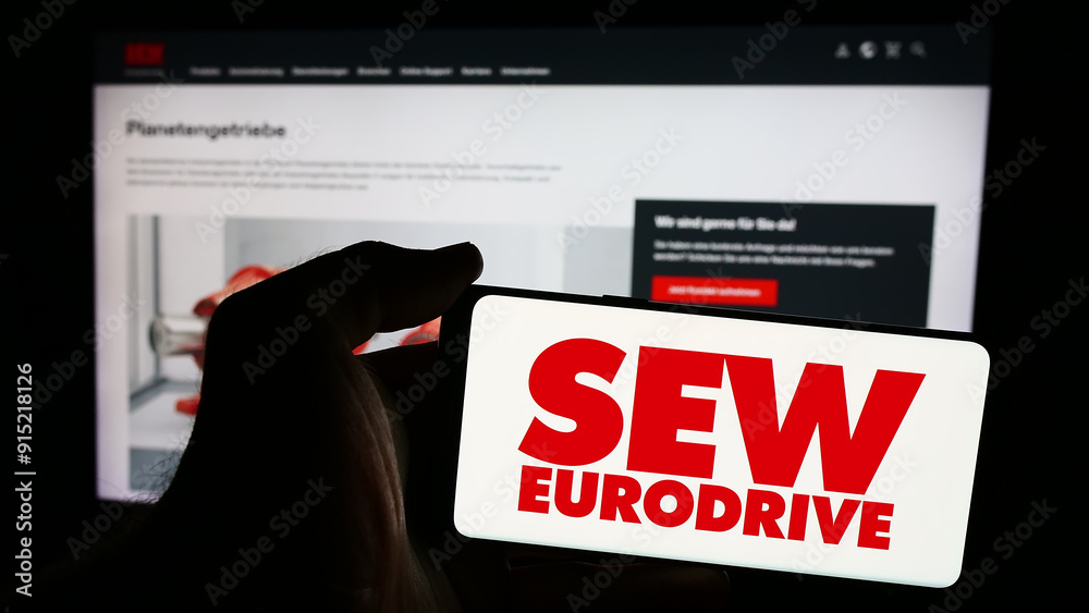 Stuttgart, Germany - 08-05-2024: Person holding mobile phone with logo ...